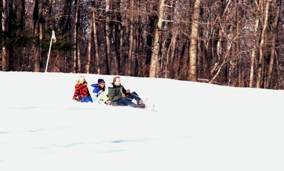 President Jimmy Carter sleds with First Daughter Amy Carter and her ...