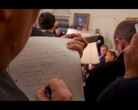 Reporter Taking Notes - White House Historical Association