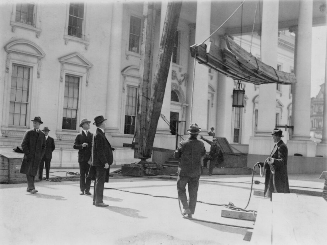 President Calvin Coolidge watches the progression of renovation work at ...