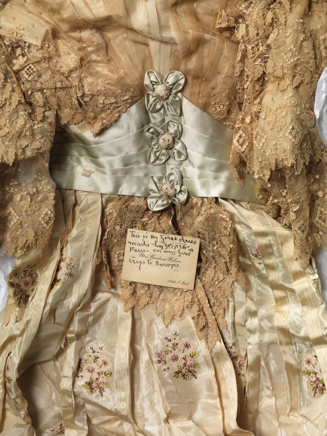 Evening coat label - White House Historical Association