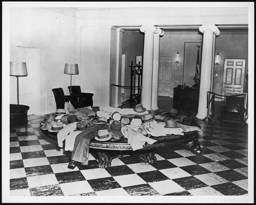 Coats on the West Wing lobby table - White House Historical Association